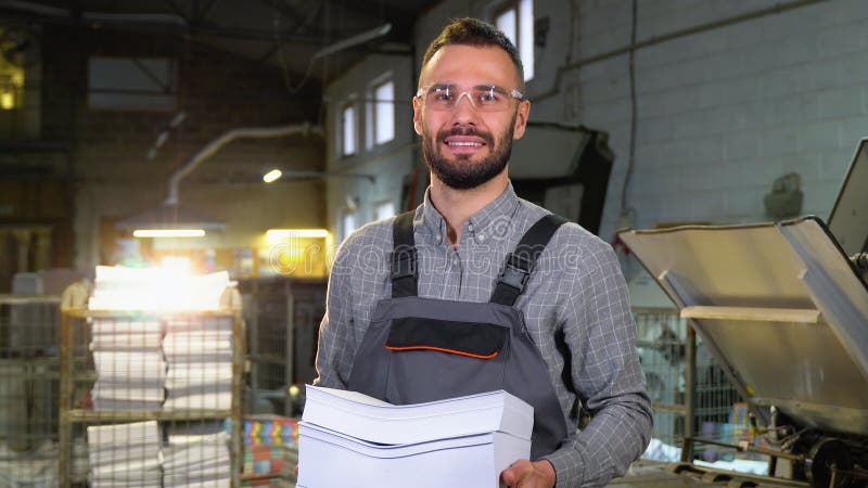 Portrait of Print Worker with Paper for Printing Stock Footage - Video ...