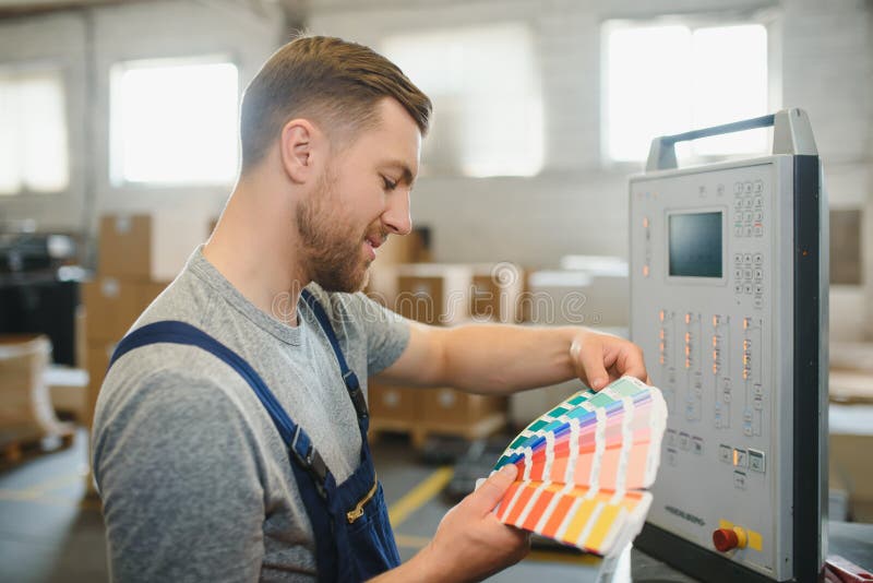 Portrait of Production Line Worker Controlling Manufacturing Process of ...