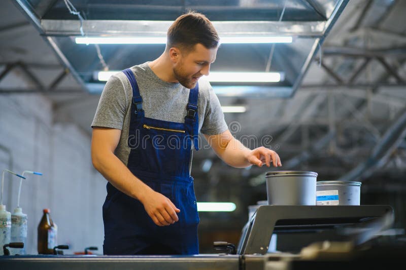 Portrait of Production Line Worker Controlling Manufacturing Process of ...