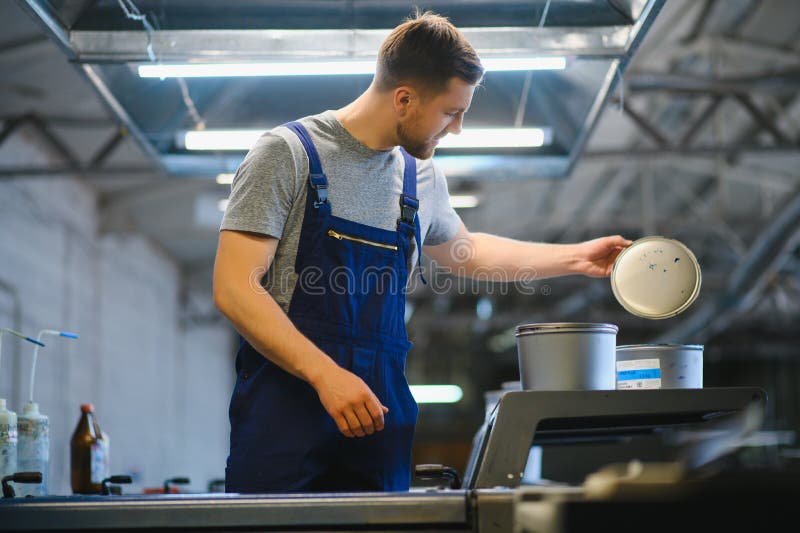 Portrait of Production Line Worker Controlling Manufacturing Process of ...