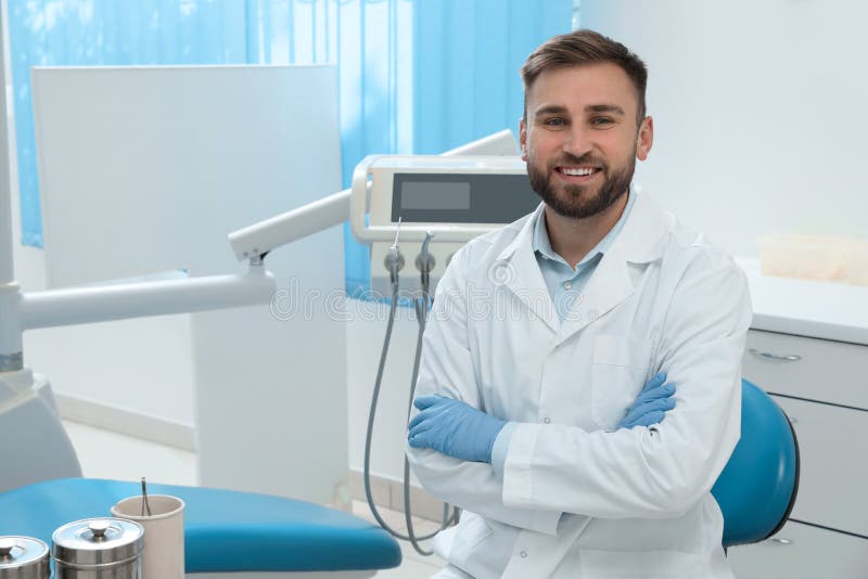 Portrait of Professional Dentist at Workplace in Clinic Stock Photo ...