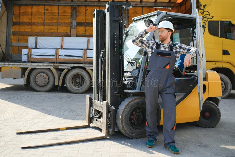 Portrait of Professional Forklift Driver in Factory& X27;s Warehouse ...