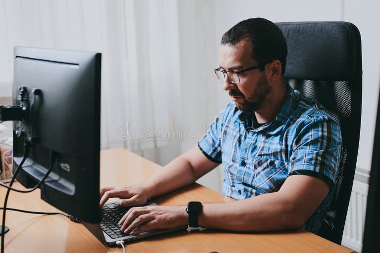Portrait Professional Man Programmer Working Concentrated on Computer in Diverse Offices. Modern ...