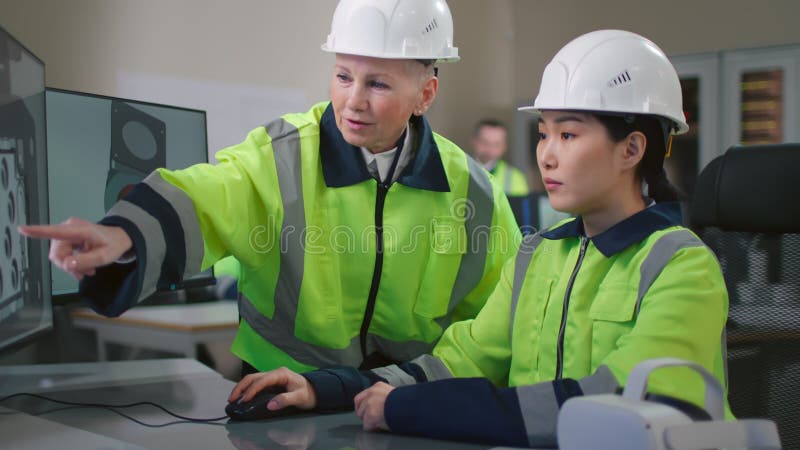 Portrait of Project Supervisor Talking with a Female Industrial ...