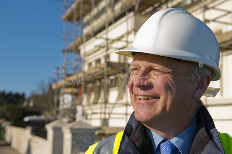 Portrait of a Property Developer / Builder with Construction Site ...