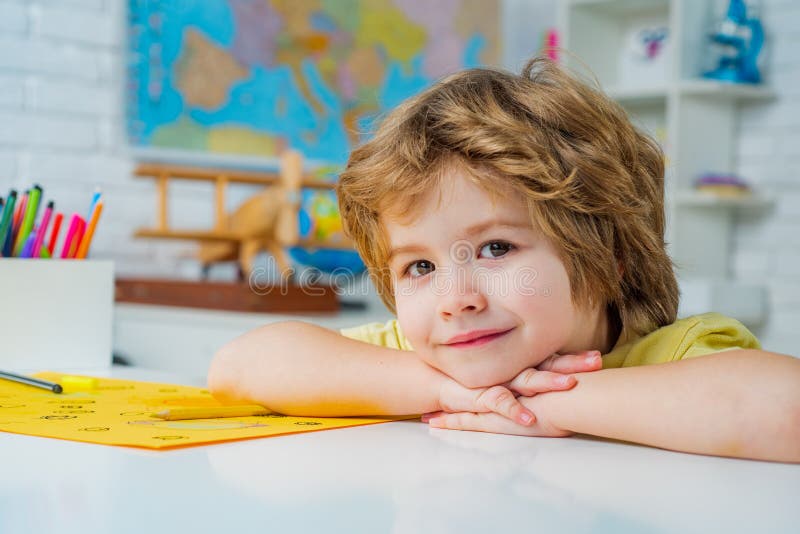 Portrait of Pupil in Classroom. First School Day. Pupil Learning ...