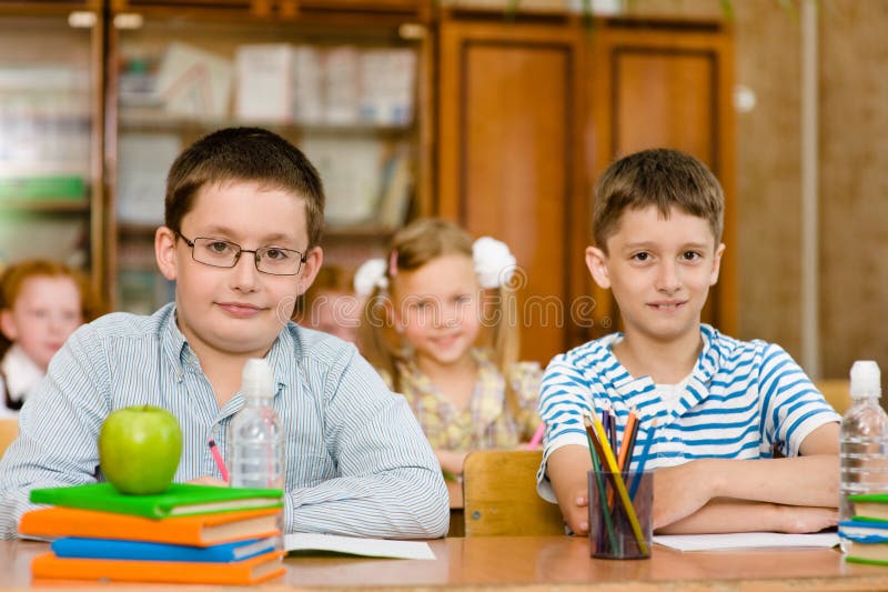 Portrait of Pupils Looking at Camera in Classroom Stock Image - Image ...