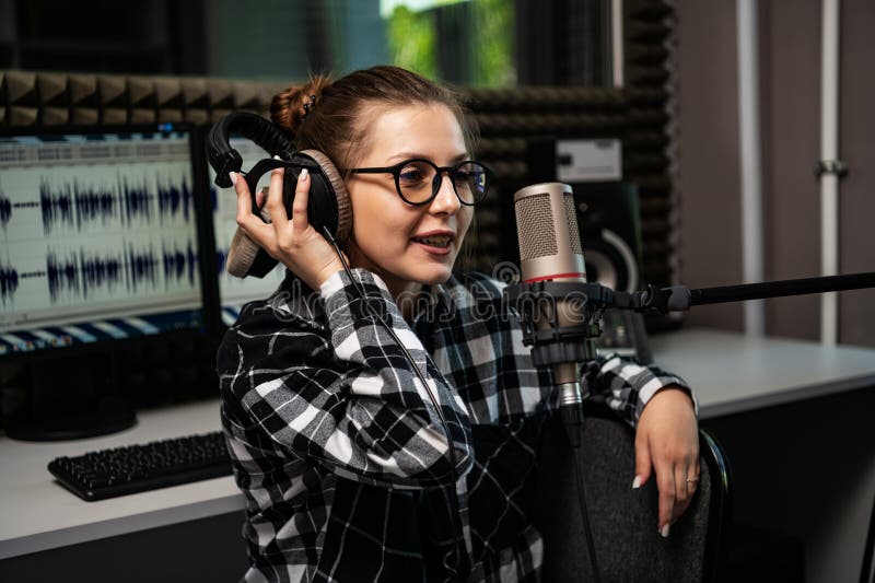 Portrait of a Radio Host Working Live in a Radio Studio with a ...