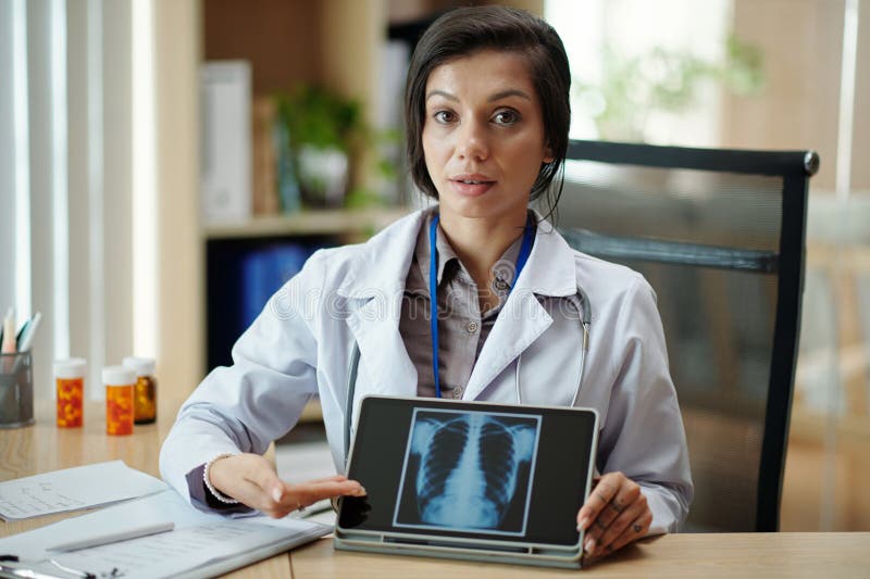 Radiologist Showing Chest X-ray Stock Photo - Image of hospital, doctor ...