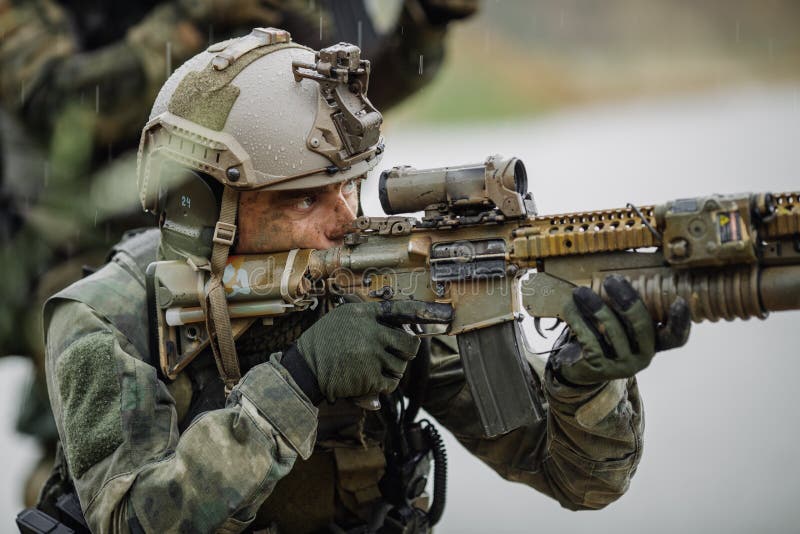 Portrait of a Ranger in the Battlefield with a Gun Stock Photo - Image ...