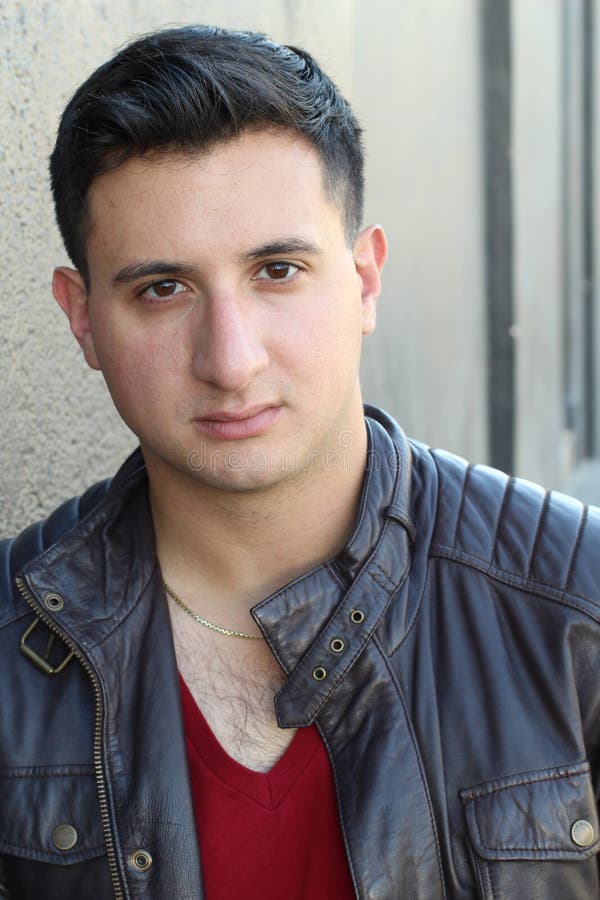 Portrait of a Real Looking Young Man Wearing Leather Jacket Stock Photo ...