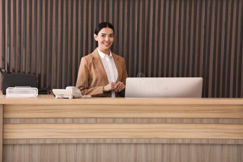 Portrait of Receptionist at Countertop Stock Photo - Image of assistant ...