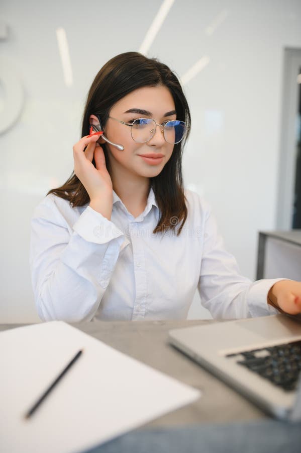 Portrait of Receptionist at Desk in Lobby Stock Photo - Image of ...