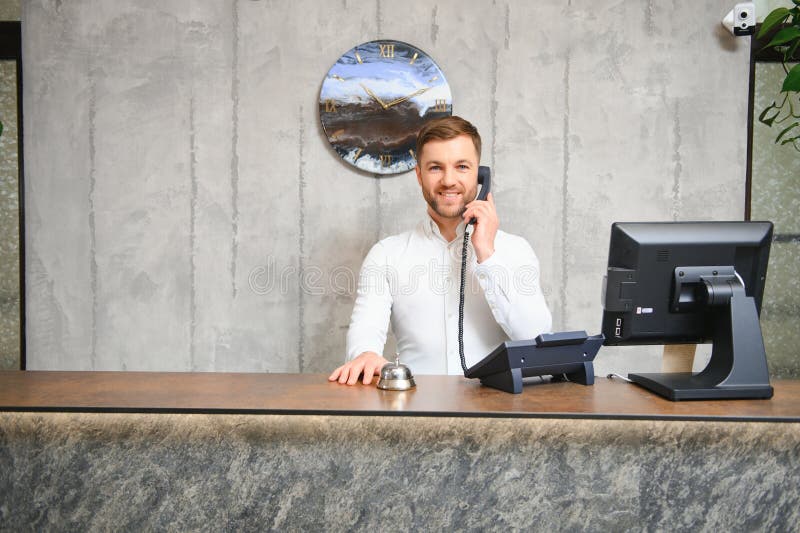 Portrait of Receptionist at Desk in Lobby Stock Photo - Image of travel ...