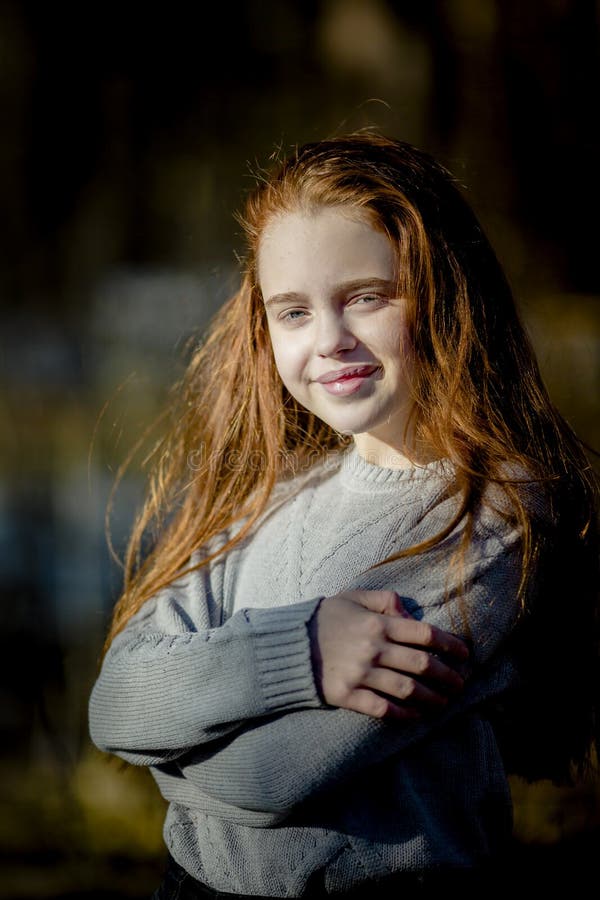 Portrait of a Red-haired Girl in the Park. Stock Photo - Image of ...