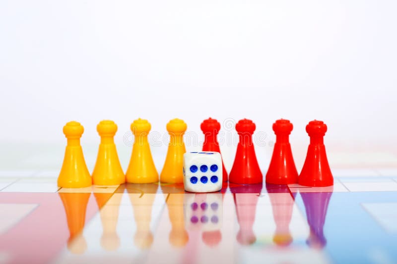 Portrait of Red and Yellow Tokens with Dice Stock Image - Image of ...