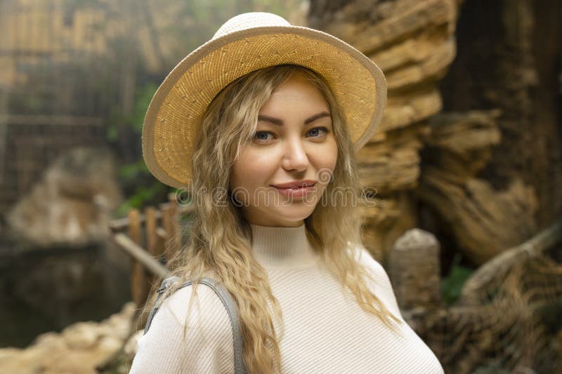 Portrait of a Relaxed Happy Woman in a Hat Looking at the Camera. Stock ...
