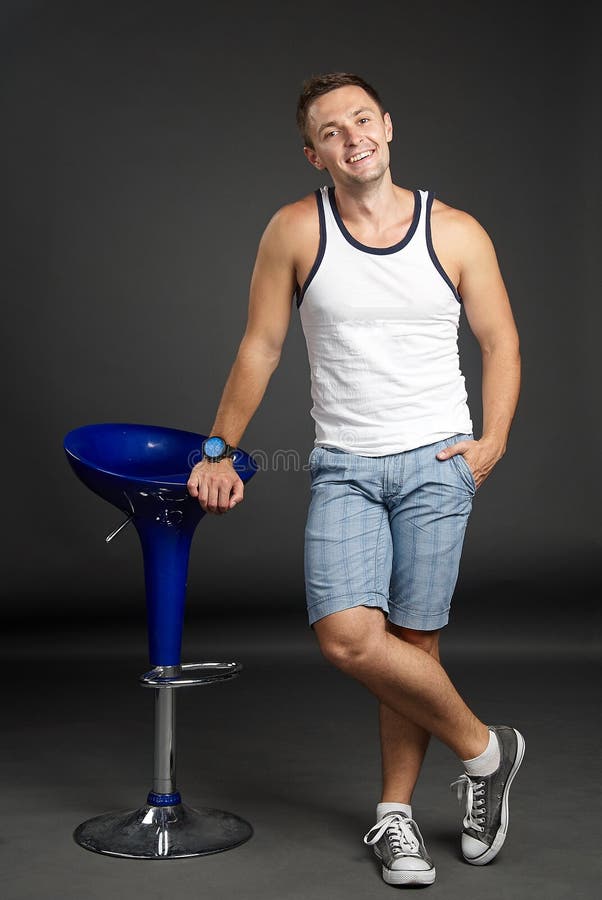 Portrait of Man in Hat Sitting on a Bar Stool Stock Image - Image of ...