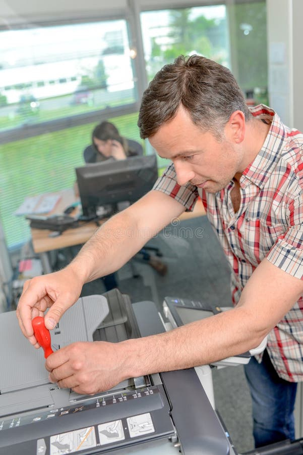 Portrait repairing printer stock photo. Image of hand - 285319666