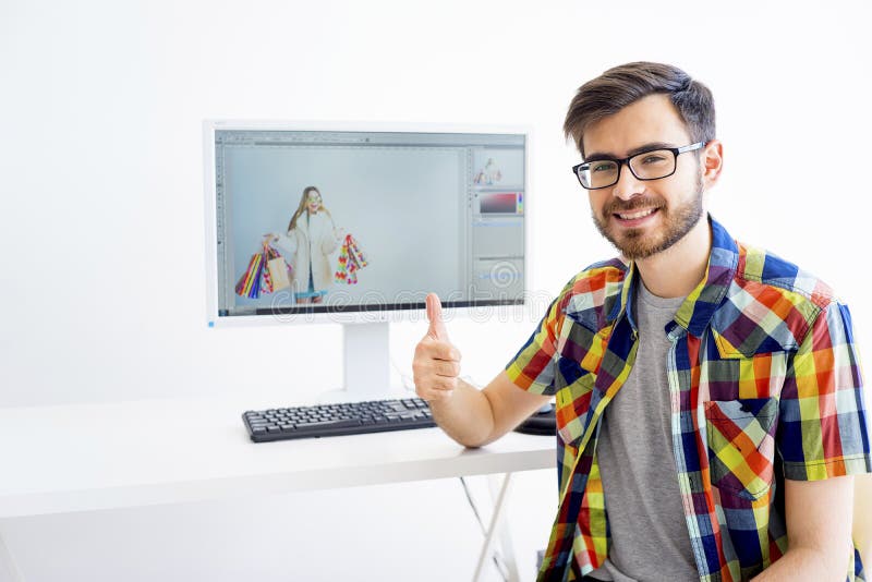 Retoucher editing photos stock photo. Image of monitor - 100265092