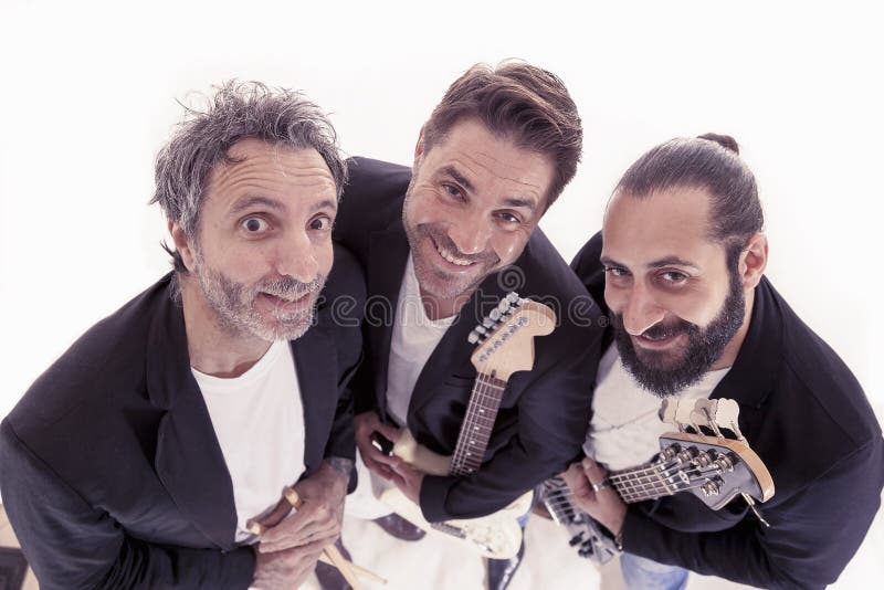 Portrait of Rock Band Trio Embraced Stock Image - Image of performance ...