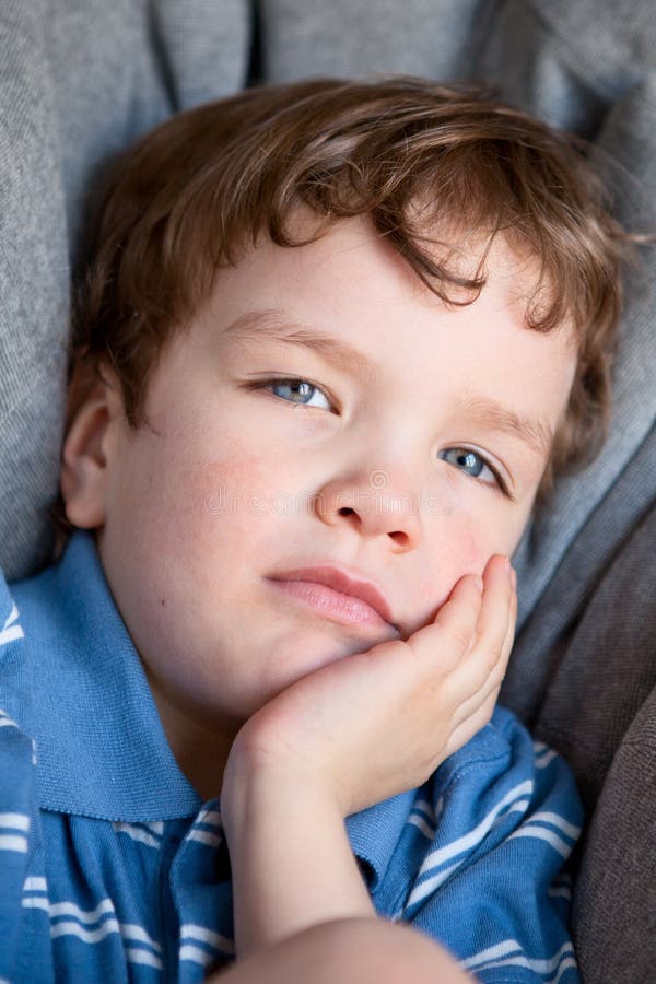 Portrait of Sad Beautiful Boy Stock Image - Image of blue, person: 23926053