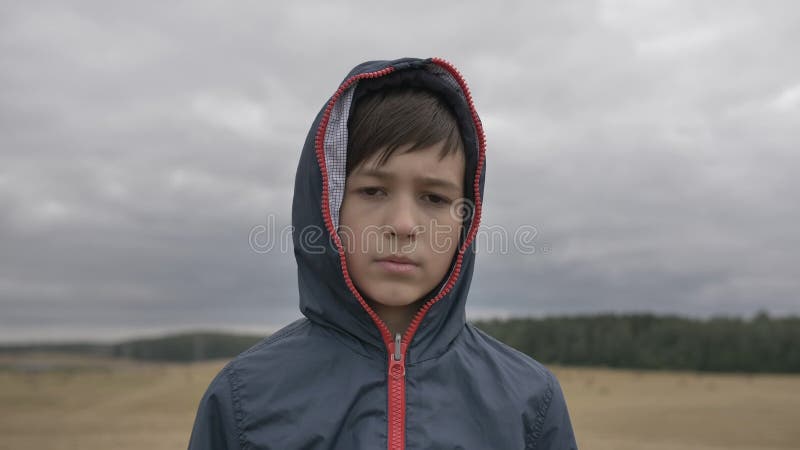 Portrait of a Sad Boy in Autumn Outdoors Close Up Stock Video - Video ...