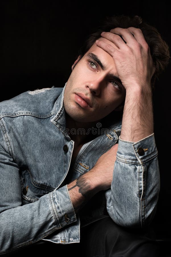 A Brooding Young Man Thinks it`s in a Gift Box Stock Image - Image of ...