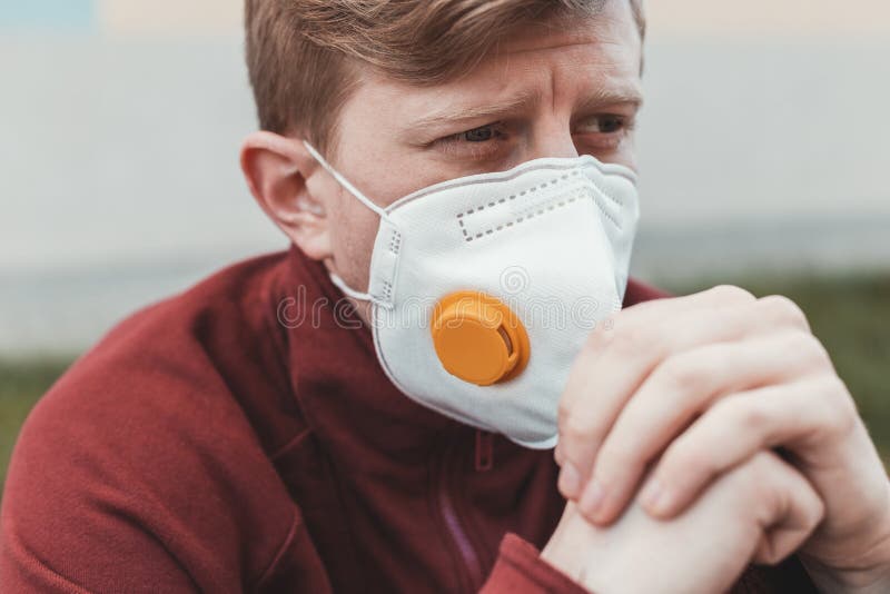 Portrait of a Sad Man with a Dramatic Facial Expression in a Protective ...