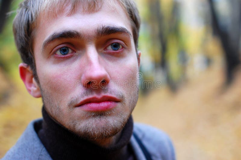 Portrait of a Sad Man in the Park Stock Photo - Image of male, hair ...