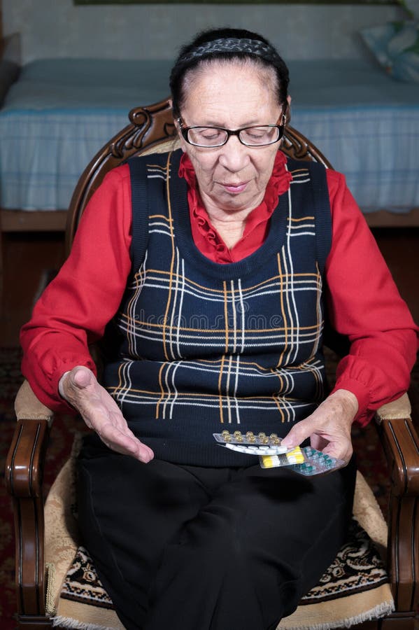 Portrait of a Sad Old Woman of an Old Woman Sits in an Armchair with ... Portrait of a Sad Old Woman of an Old Woman Sits in an Armchair with ...