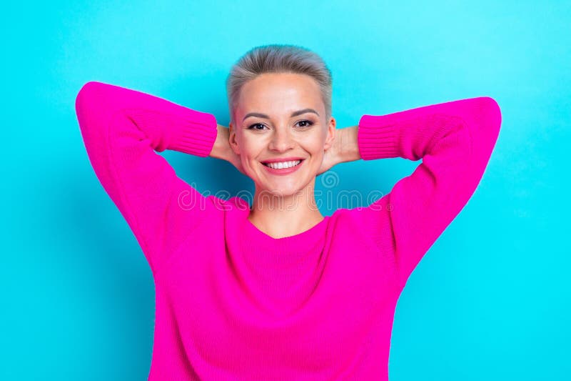 Portrait Of Satisfied Cute Girl With Short Hair Wear Pullover Holding