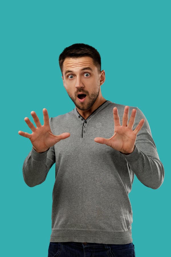 Scared Bearded Man with His Hands on His Face and Wide Eyes Isolated on ...