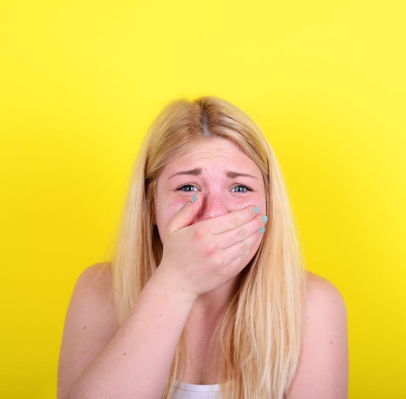 Portrait of Scared Girl Against Yellow Background Stock Photo - Image ...
