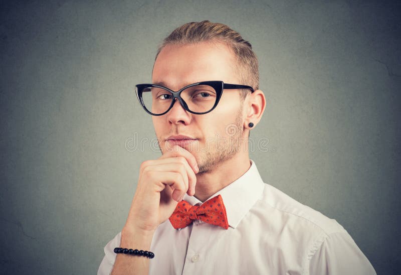 Portrait of a Sceptical Thoughtful Man Looking at Camera Stock Photo ...