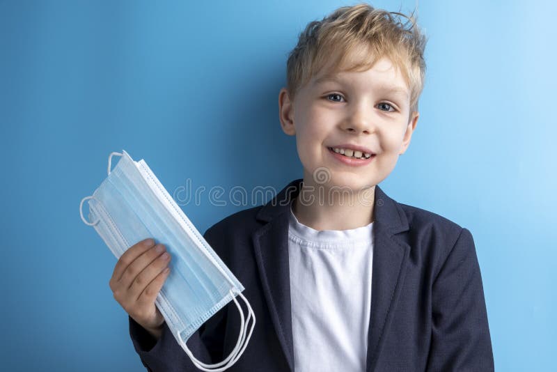 Portrait of School Boy with Face Mask and School Uniform. Blue ...