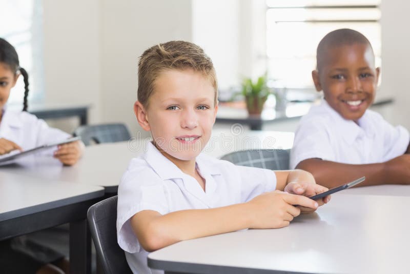 Portrait of School Kid Using Mobile Phone in Classroom Stock Photo ...