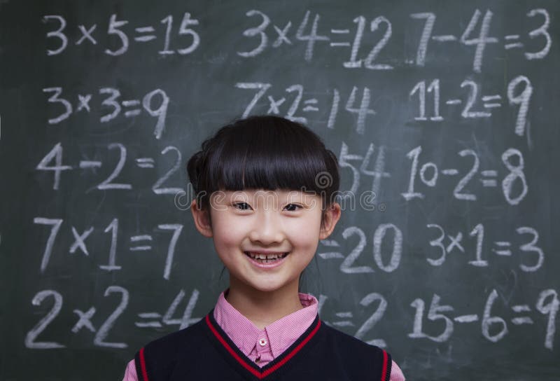 Portrait of Schoolgirl in Front of Blackboard with Math Equations Stock ...