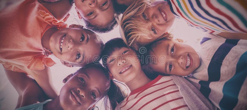 Portrait of Schoolkids Forming Huddle Stock Image - Image of innocence ...