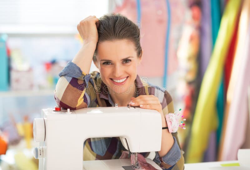 Portrait of Seamstress with Sewing Machine Stock Photo - Image of ...