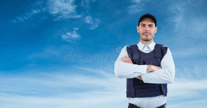 Portrait of Security Guard with Arms Crossed Standing Against Sky Stock ...