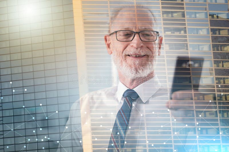 Portrait of Senior Businessman Looking at His Mobile Phone; Multiple ... Portrait of Senior Businessman Looking at His Mobile Phone; Multiple ...