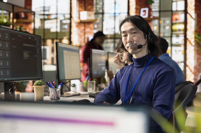 Portrait of Senior Call Center Agent Wearing Headset Resolving Clients ...