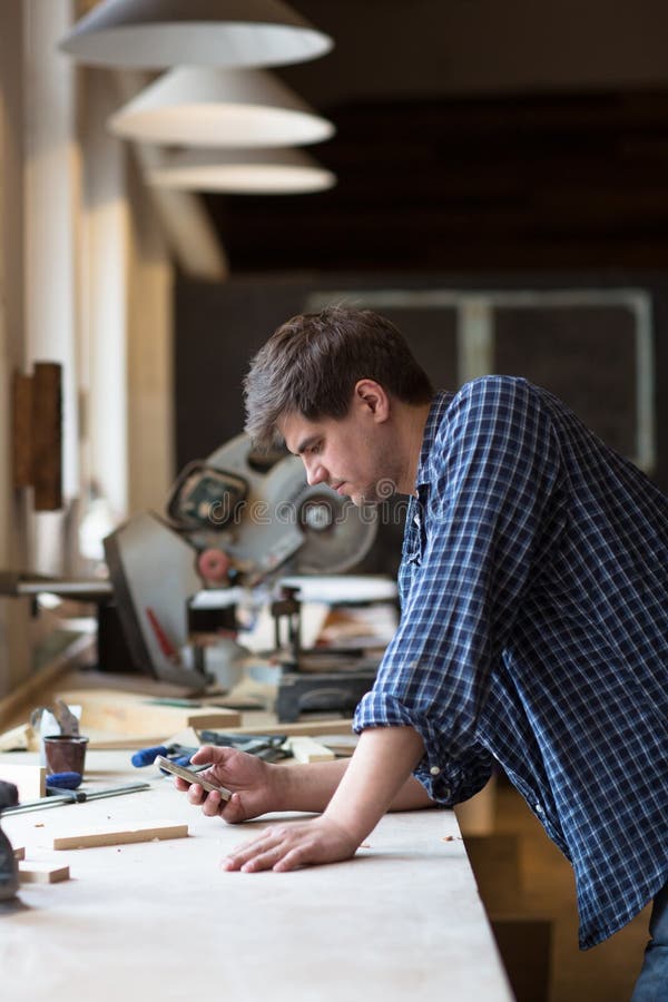 Portrait of Senior Carpenter Working at His Workshop while Stay Stock ...