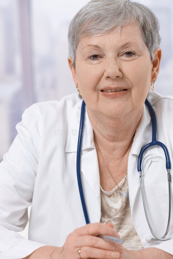 Portrait of senior doctor stock photo. Image of female - 17727174