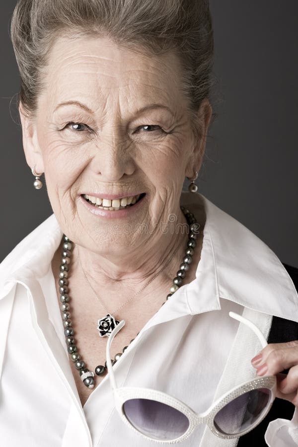 Portrait of a senior lady stock photo. Image of beauty - 5181736