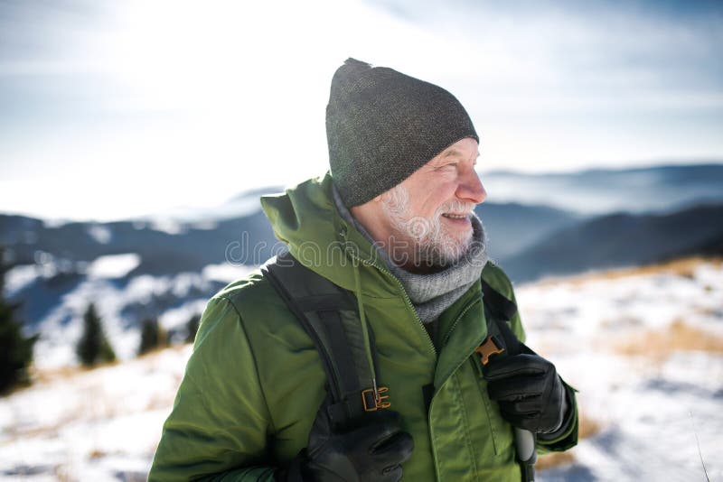 Portrait of Senior Man Standing in Snow-covered Winter Nature. Stock ...