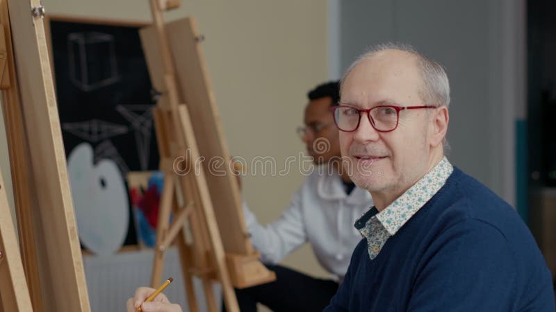 Portrait of Senior Man Using Pencil To Learn Drawing Skills Stock ...