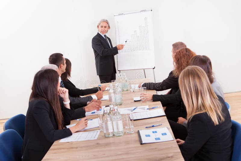 Portrait of a Senior Manager Giving Presentation Stock Image - Image of ...