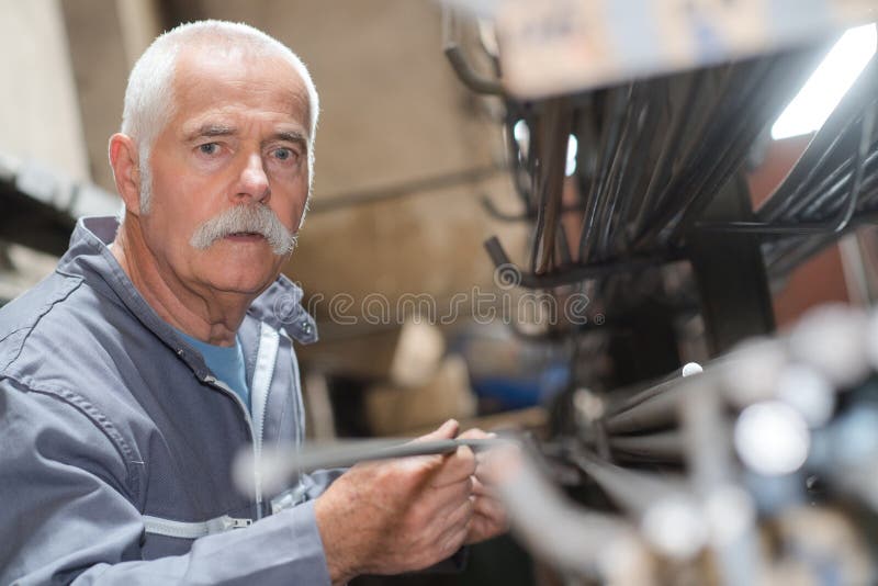 Portrait Senior Metallurgy Worker Stock Image - Image of craftsmanship ...